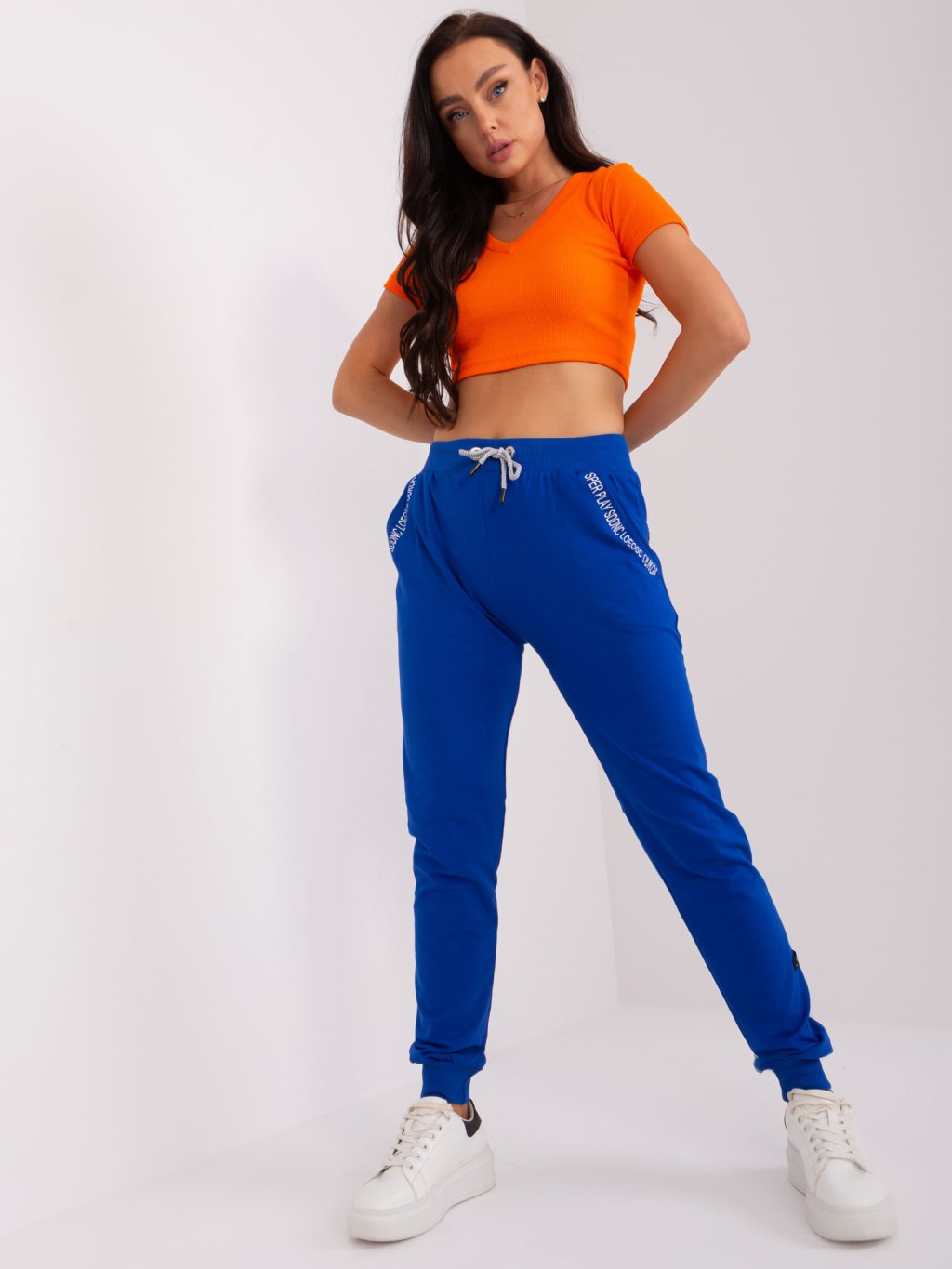 Modré tepláky s kapsami - LondonClub.cz